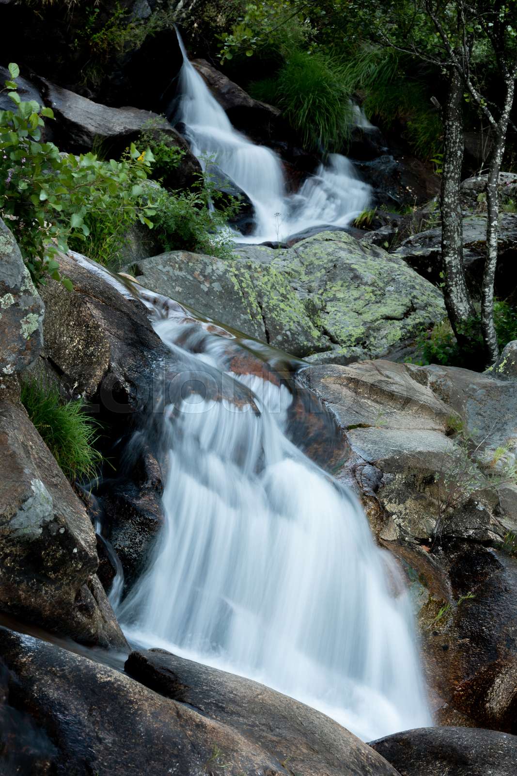 Beautiful waterfall and big rocks | Stock image | Colourbox