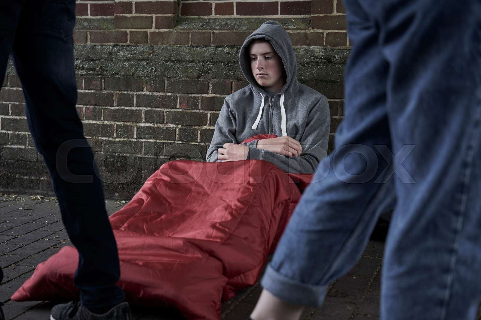 Vulnerable Teenage Boy Sleeping On The Street | Stock image | Colourbox