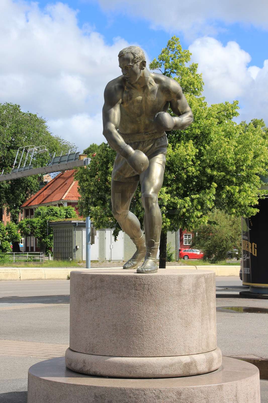 blue sky with clouds and the statue of the boxer in the neighbourhood ...