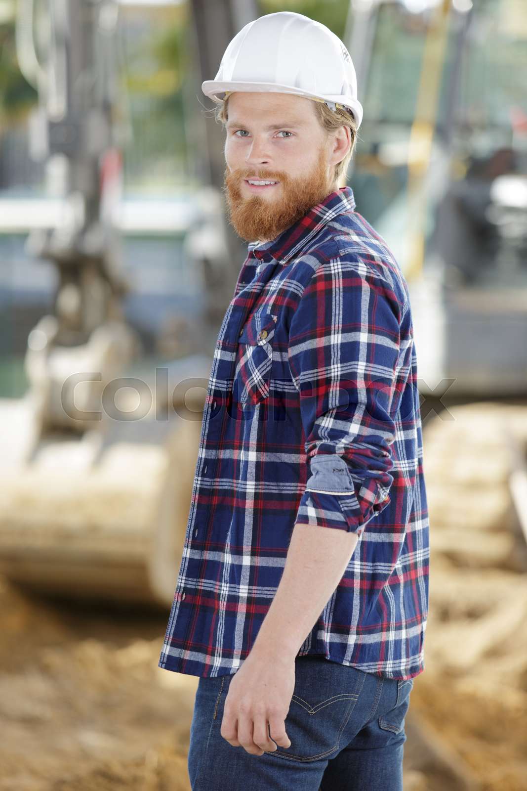 male builder on construction site | Stock image | Colourbox