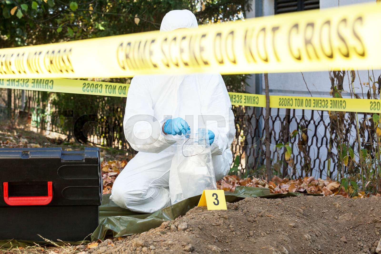 Crime scene investigator at work | Stock image | Colourbox