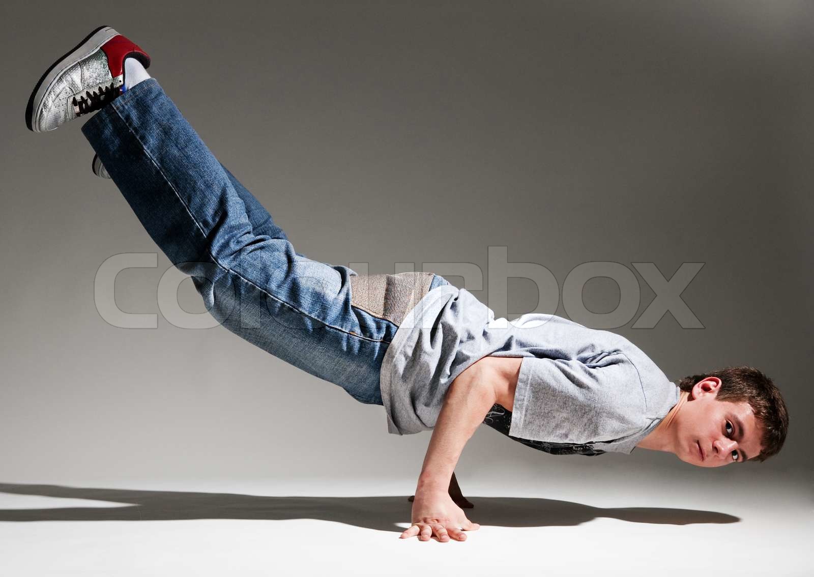 breakdancer balancing on his hands | Stock image | Colourbox