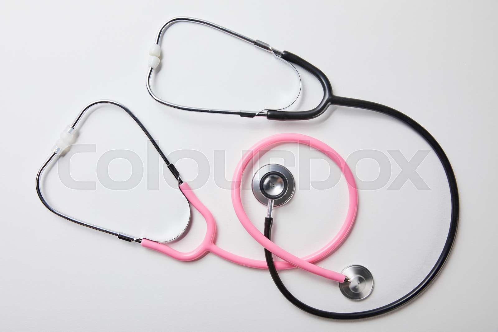top view of two stethoscopes isolated on white | Stock image | Colourbox