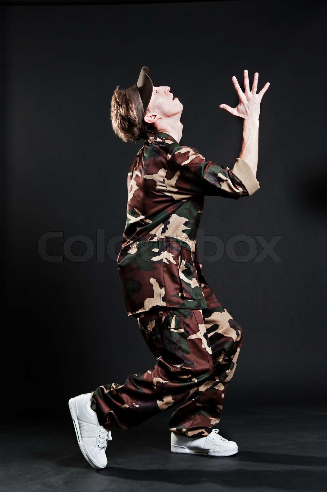 hip hop dancer in military uniform | Stock image | Colourbox