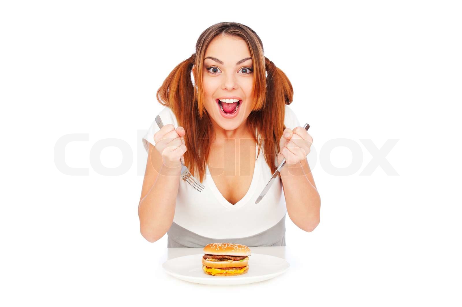hungry woman with burger | Stock image | Colourbox