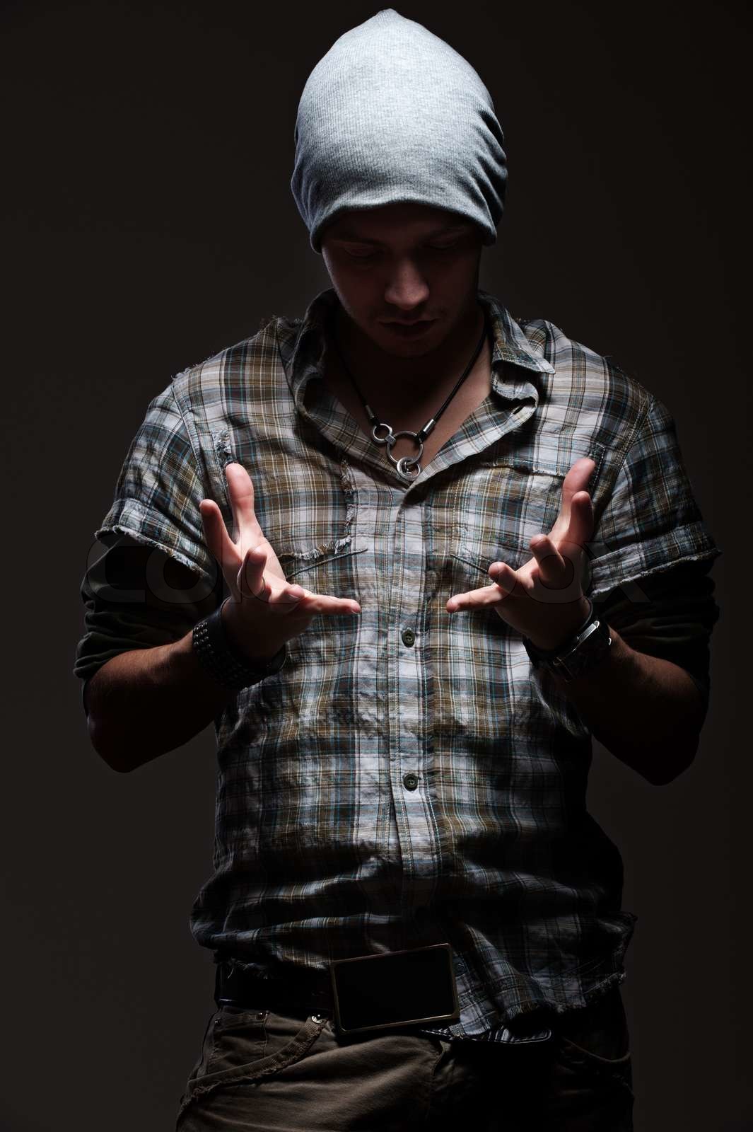 man holding something in his hands | Stock image | Colourbox