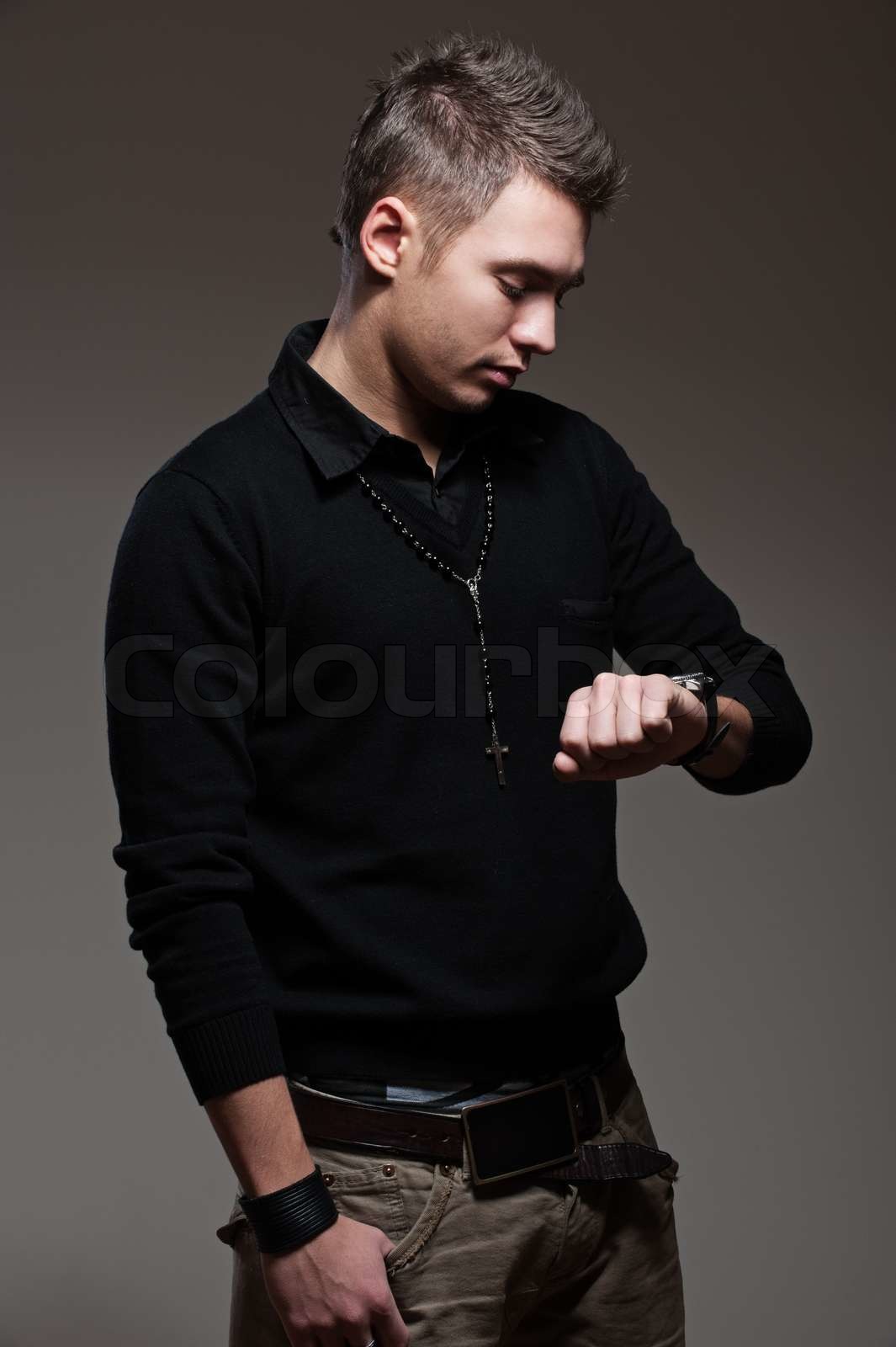 man looking at watch | Stock image | Colourbox