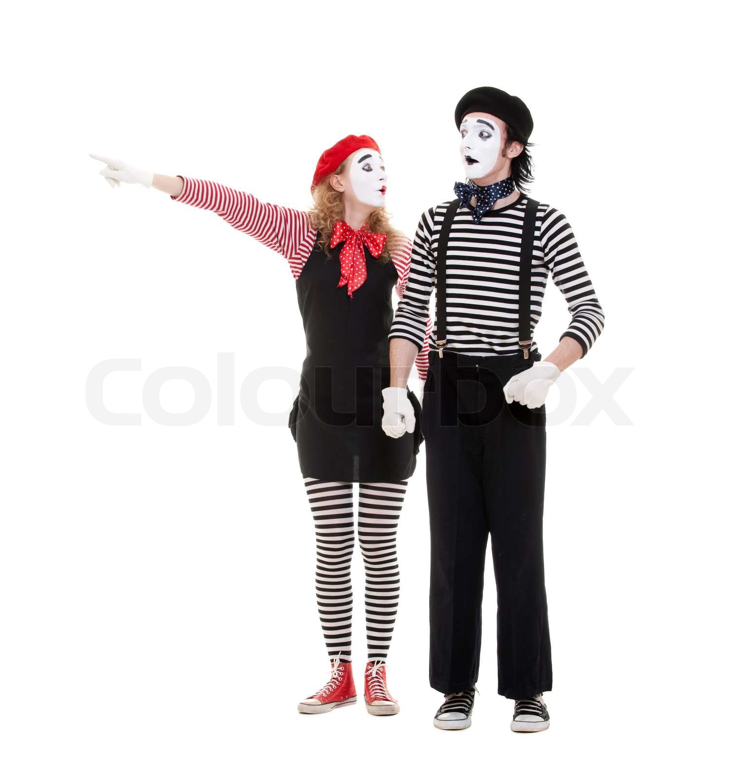 Porträt des Mimen Frau zeigte auf etwas | Stock Bild | Colourbox