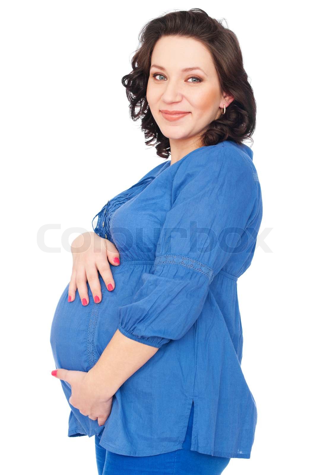 pregnant woman hug her tummy | Stock image | Colourbox