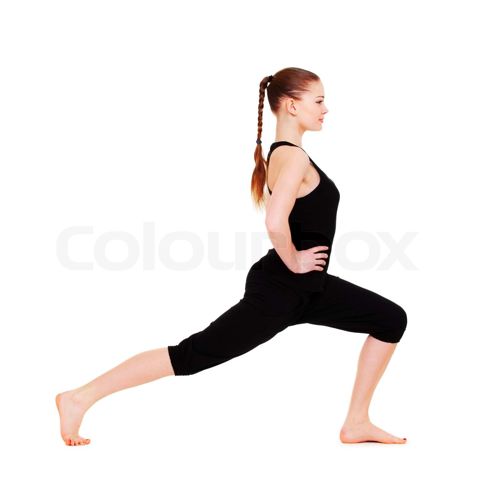 smiley woman doing flexibility exercise | Stock image | Colourbox