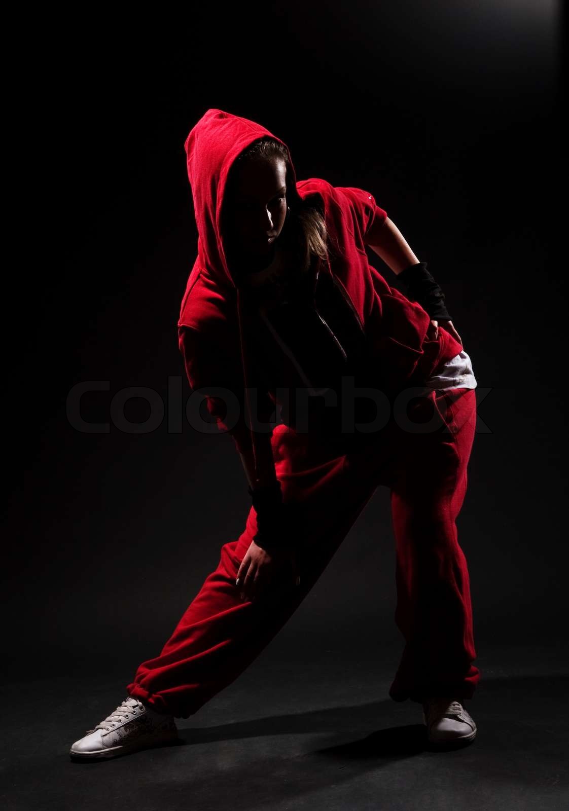 stylish hip hop girl in red | Stock image | Colourbox