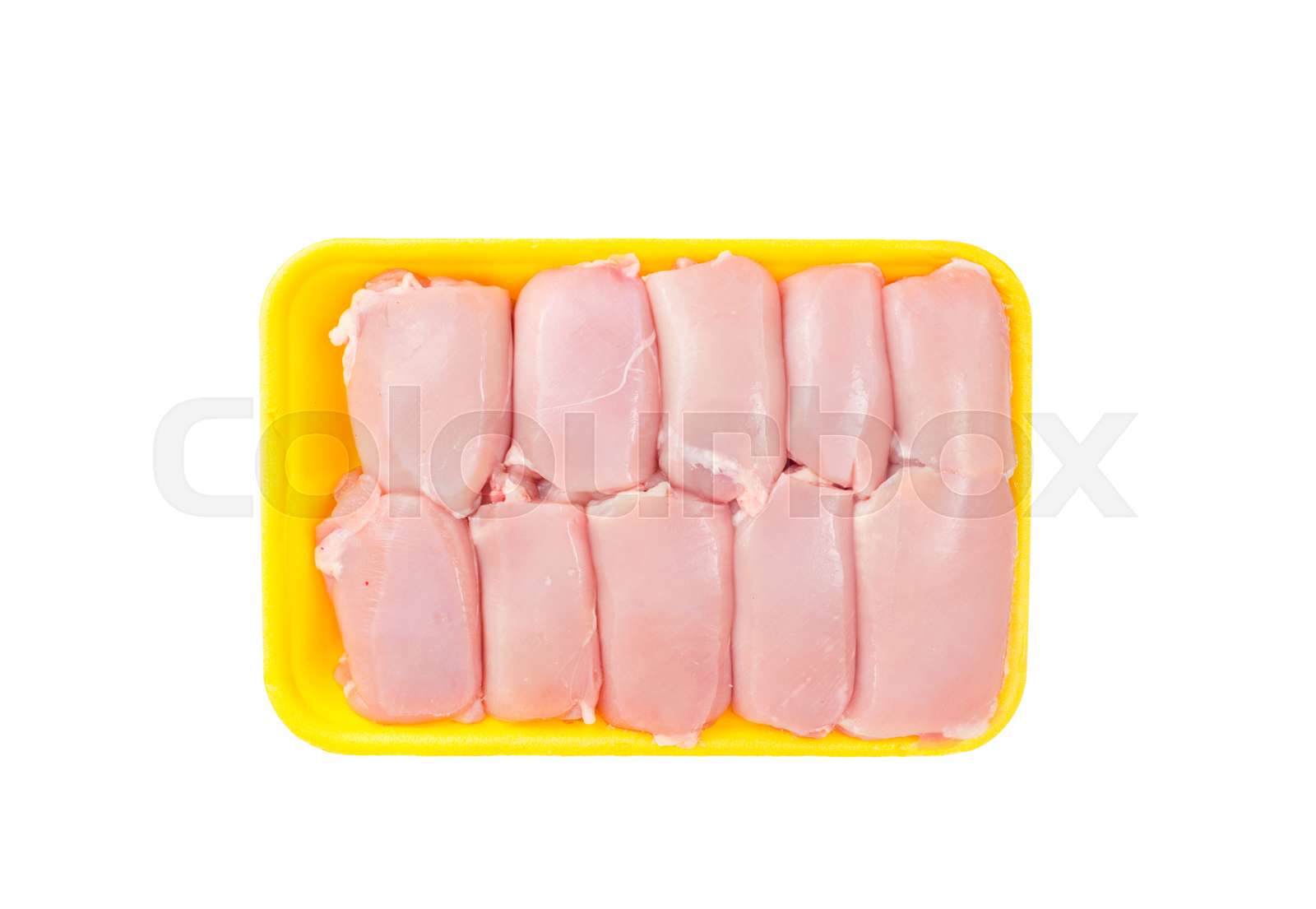 Raw chicken thigh meat without skin in tray. | Stock image | Colourbox