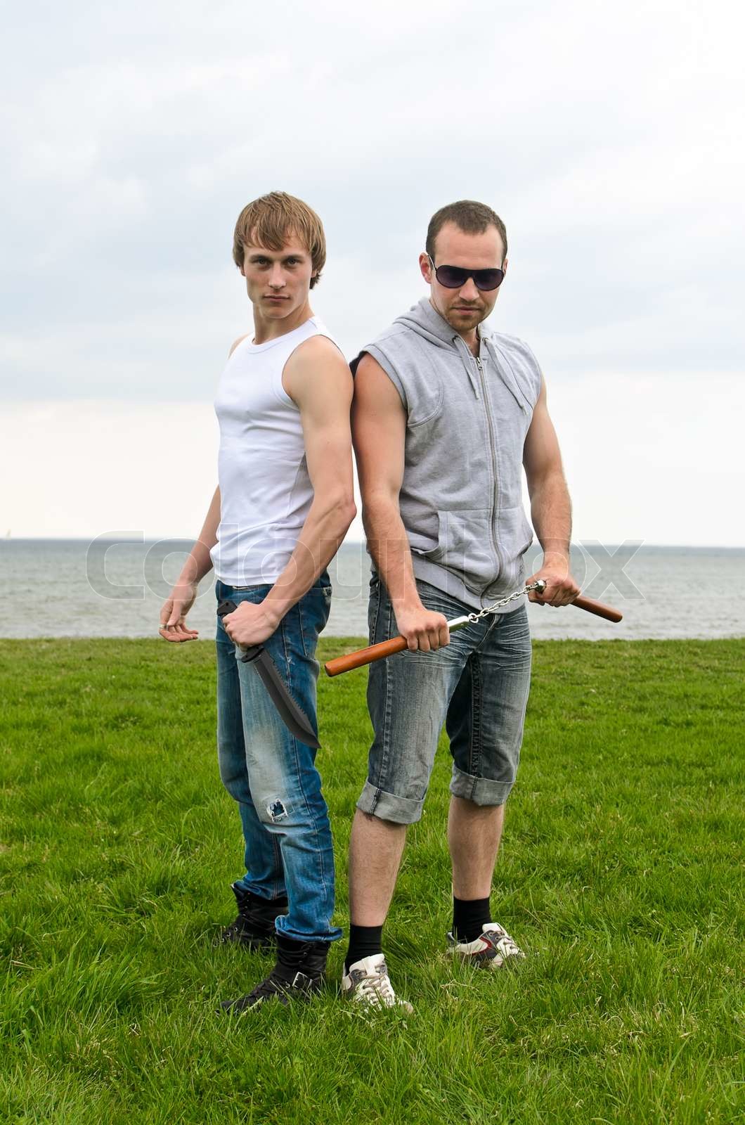 Fight club: Two fighters standing back to back | Stock image | Colourbox