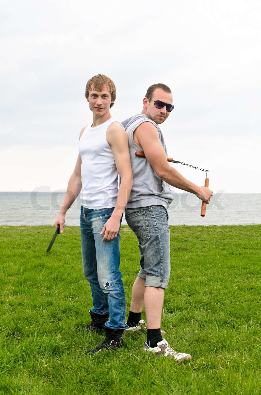 Fight club: Two fighters standing back to back | Stock image | Colourbox