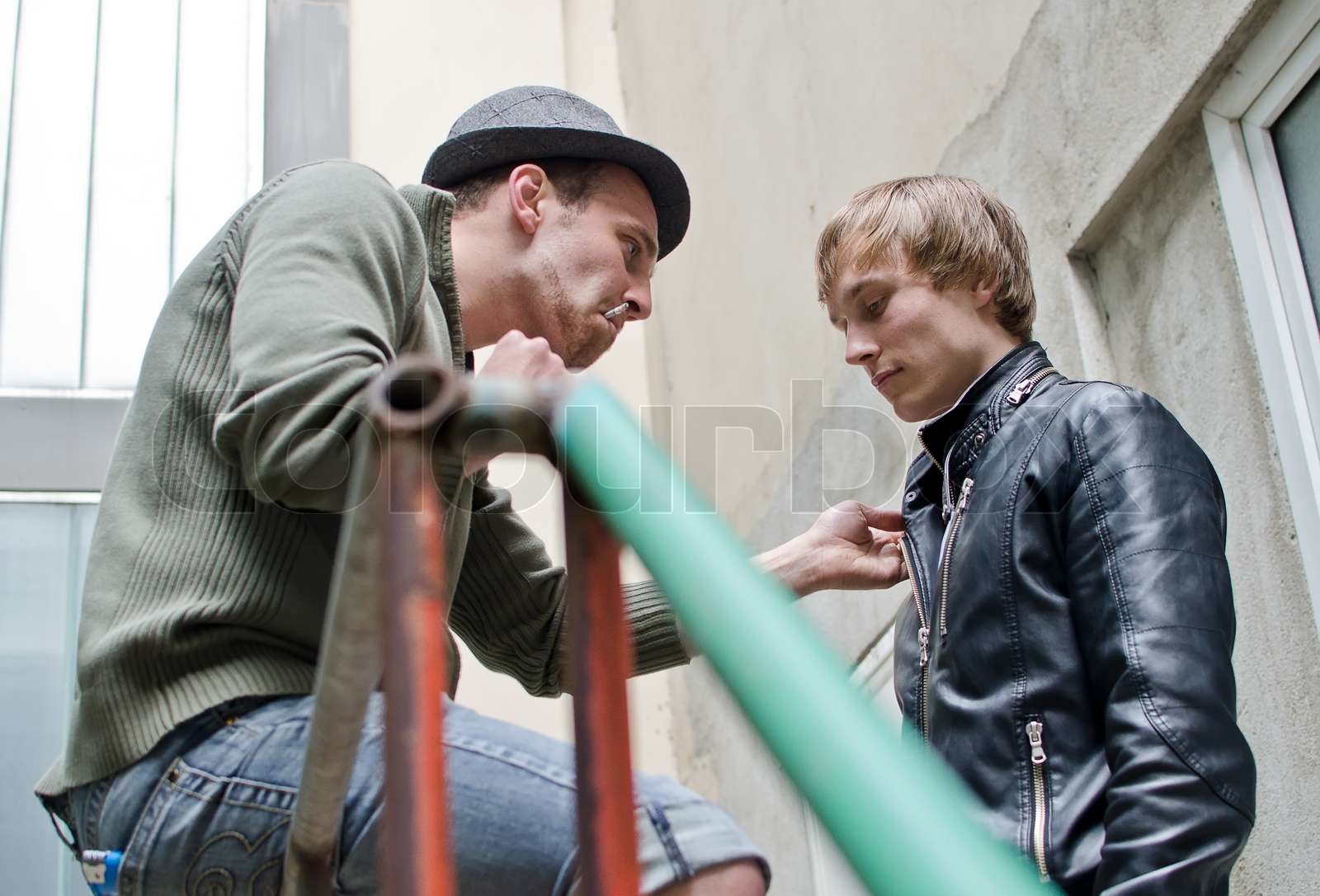 Mafia Conversation between two street thugs | Stock image | Colourbox