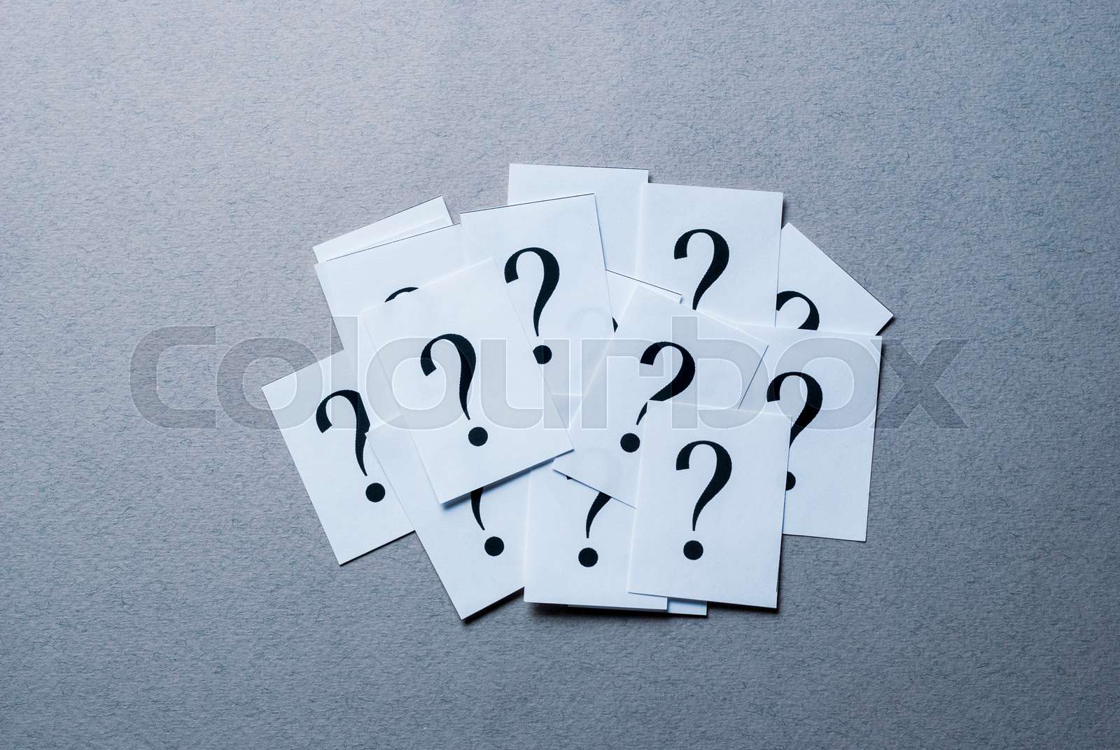 Pile of printed question marks on paper | Stock image | Colourbox