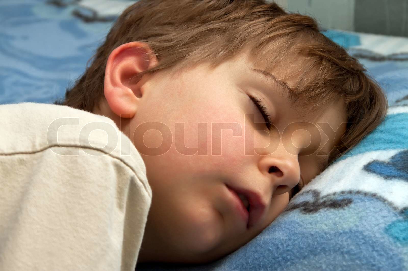 Sleeping child | Stock image | Colourbox