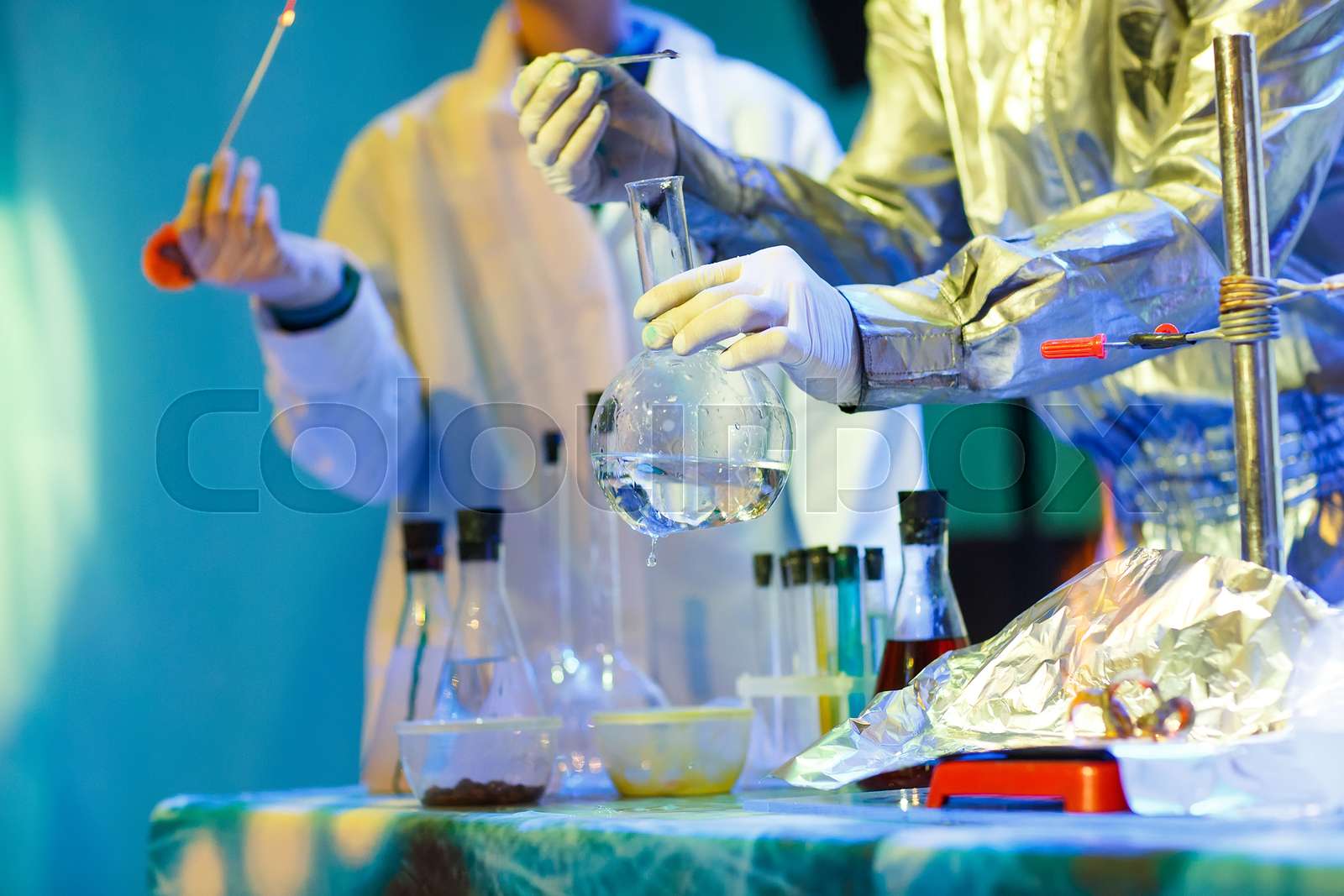 Experiments in a chemistry lab. conducting an experiment in the ...