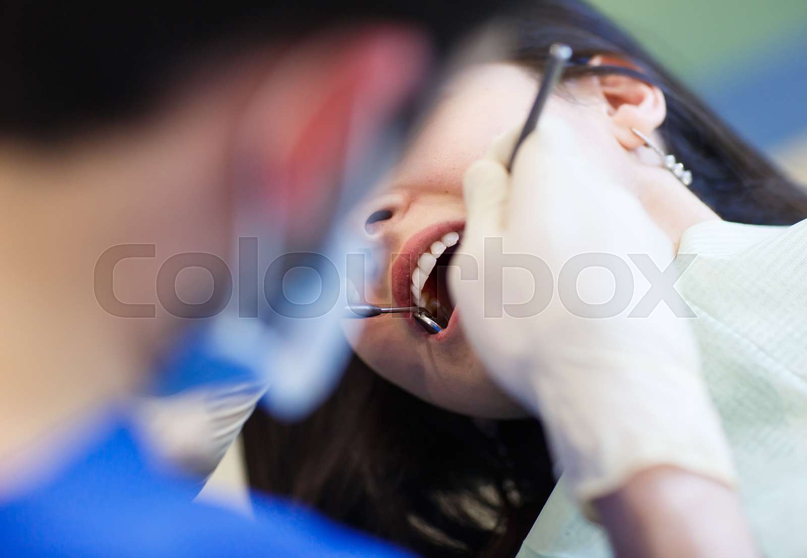 The patient caring for teeth in the dental clinic | Stock image | Colourbox
