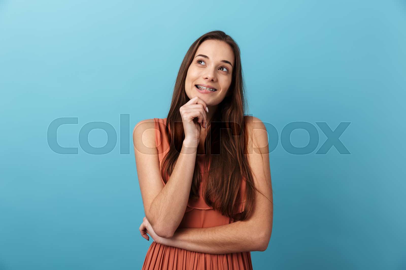 Cute lovely young girl standing isolated | Stock image | Colourbox