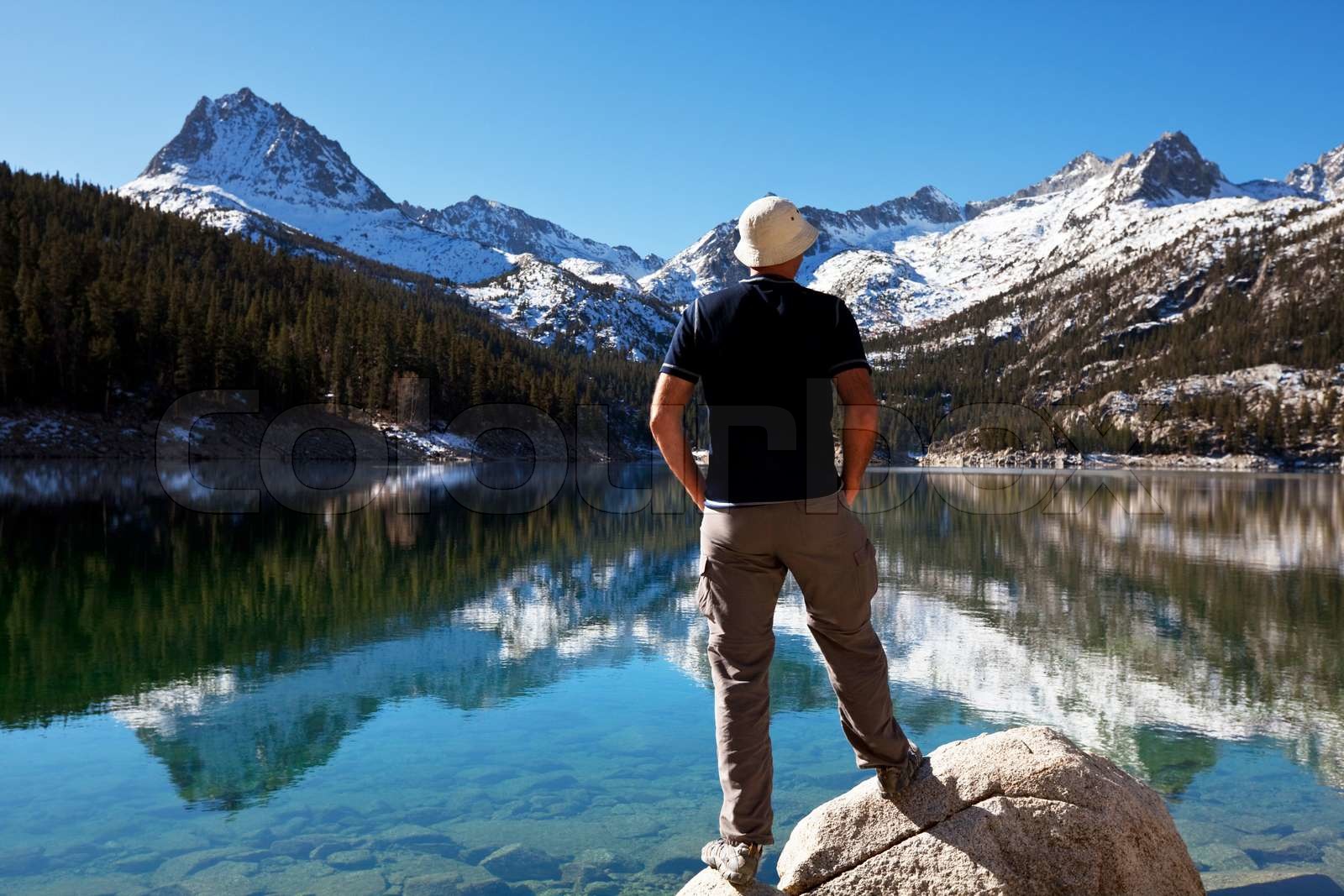 Man on lake | Stock image | Colourbox