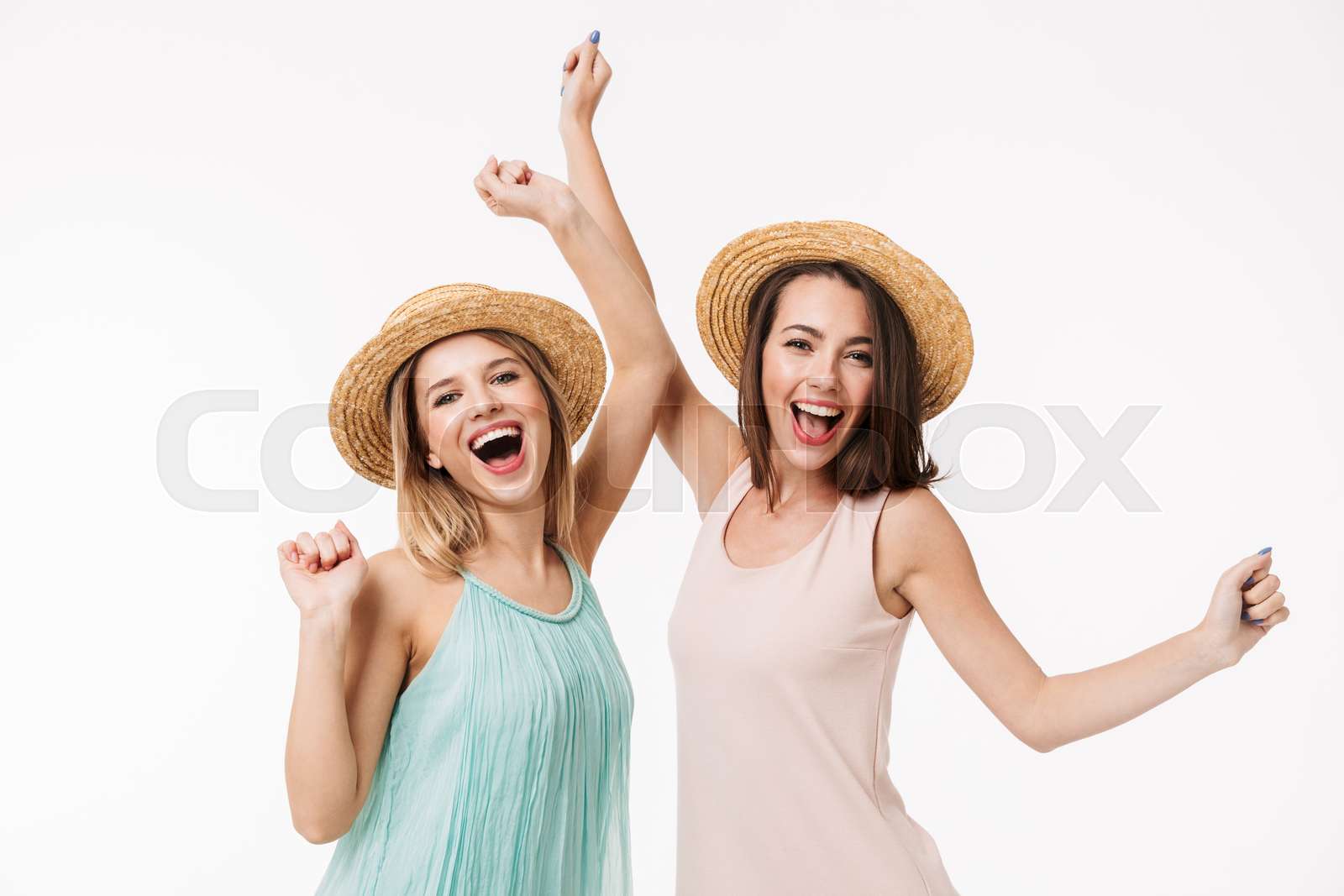 Two cheerful young girls wearing summer clothes | Stock image | Colourbox