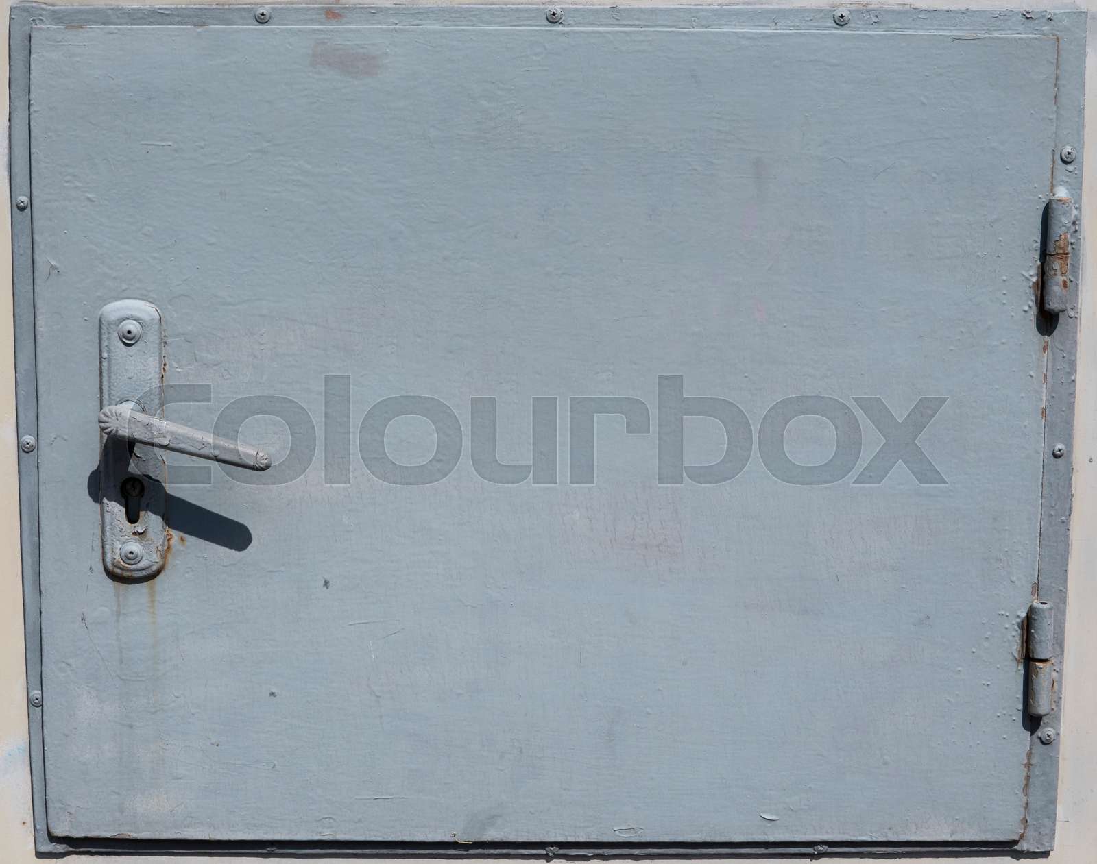 Small metal door of inbuilded metallic cabinet on external walls ...