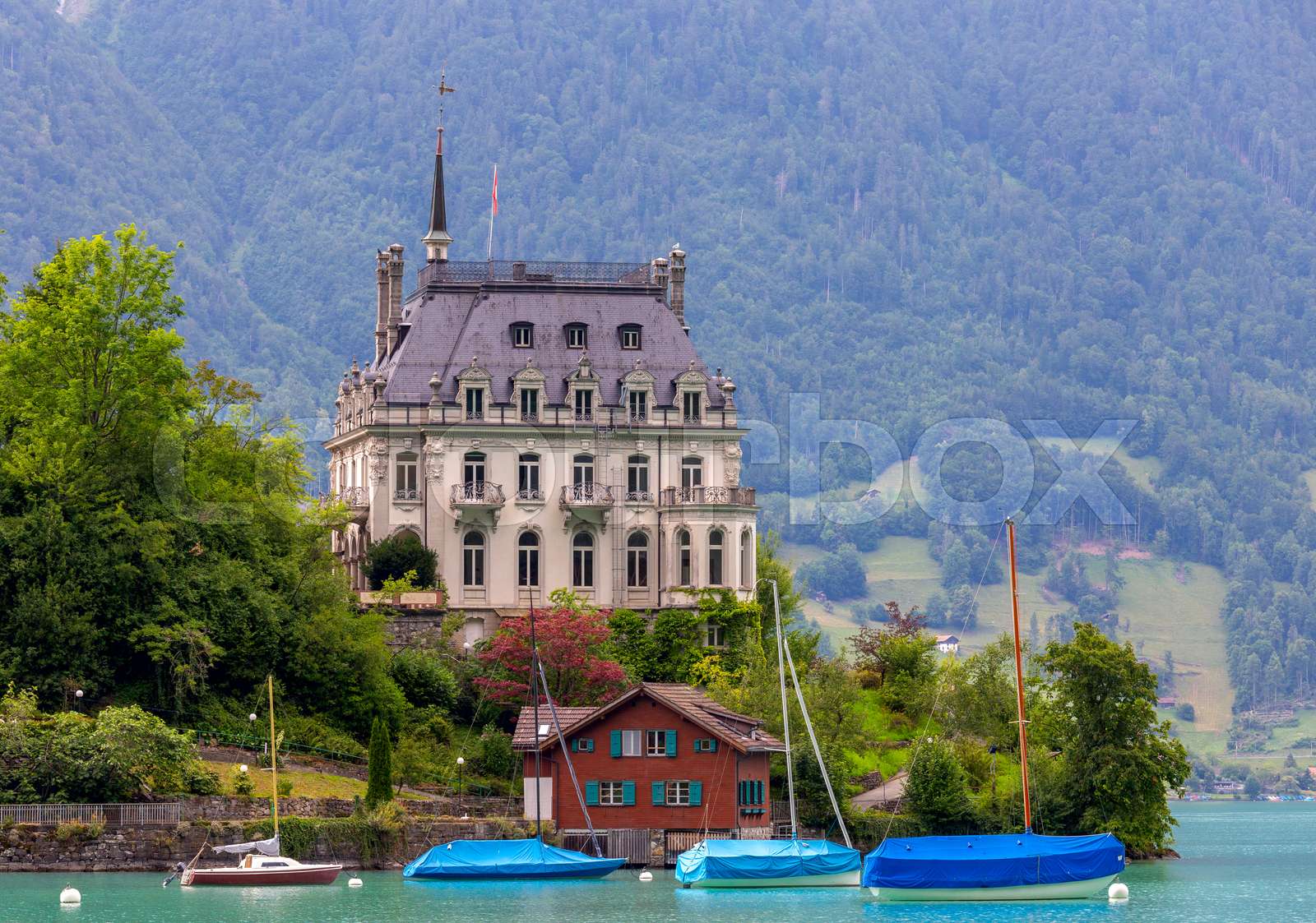 The Swiss village of Iseltwald on the famous lake Brienz. | Stock image ...