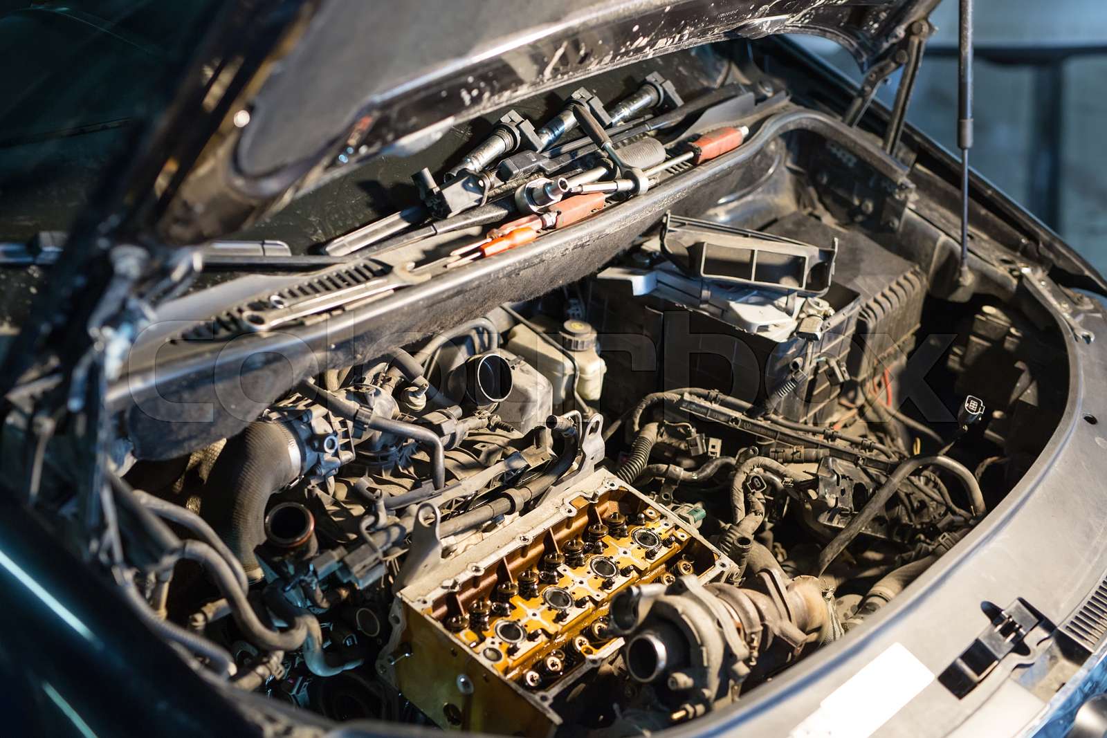 Disassembled motor vehicle for repair. Repair service. | Stock image ...