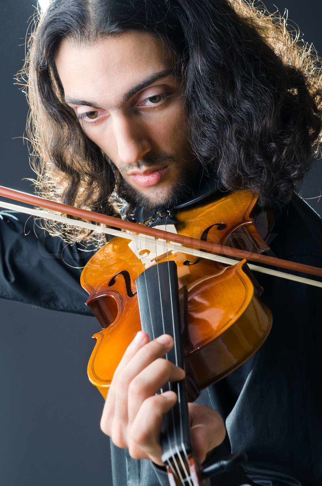 Fiddler playing the violin | Stock image | Colourbox