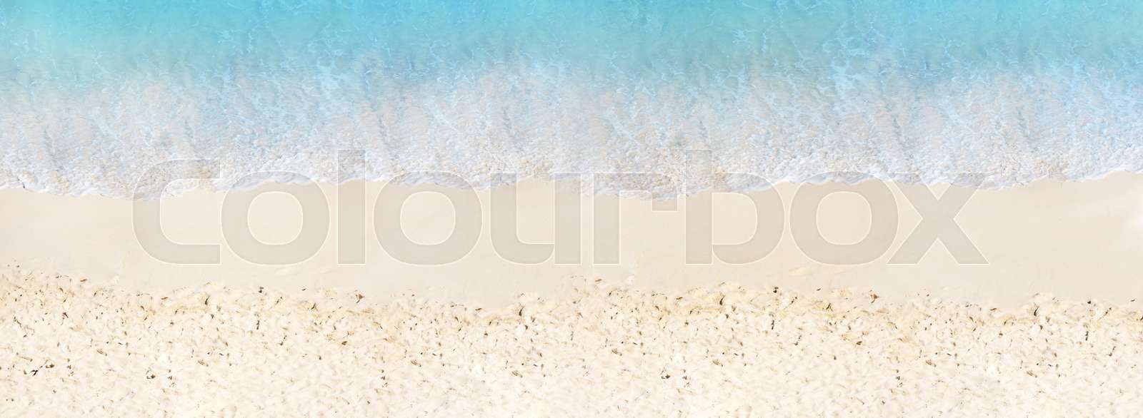 Sea beach with water hitting sand view from above | Stock image | Colourbox
