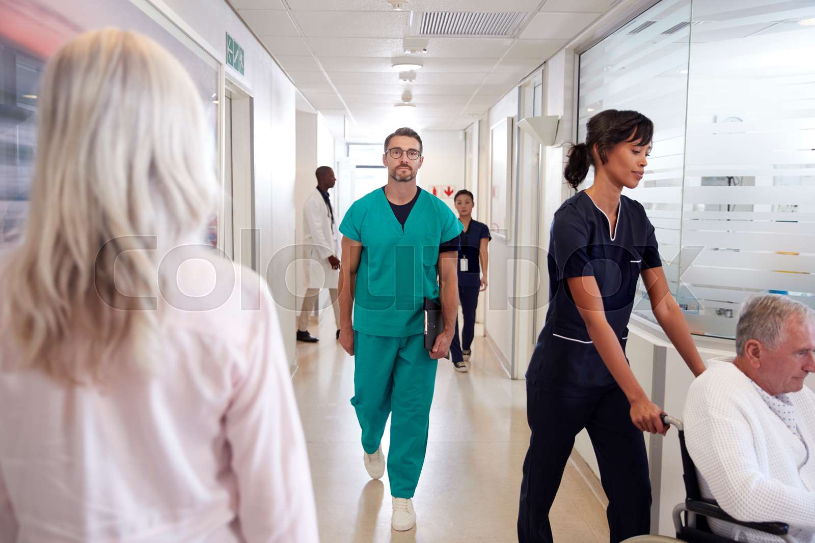 Busy Hospital Corridor With Medical Staff And Patients | Stock image ...