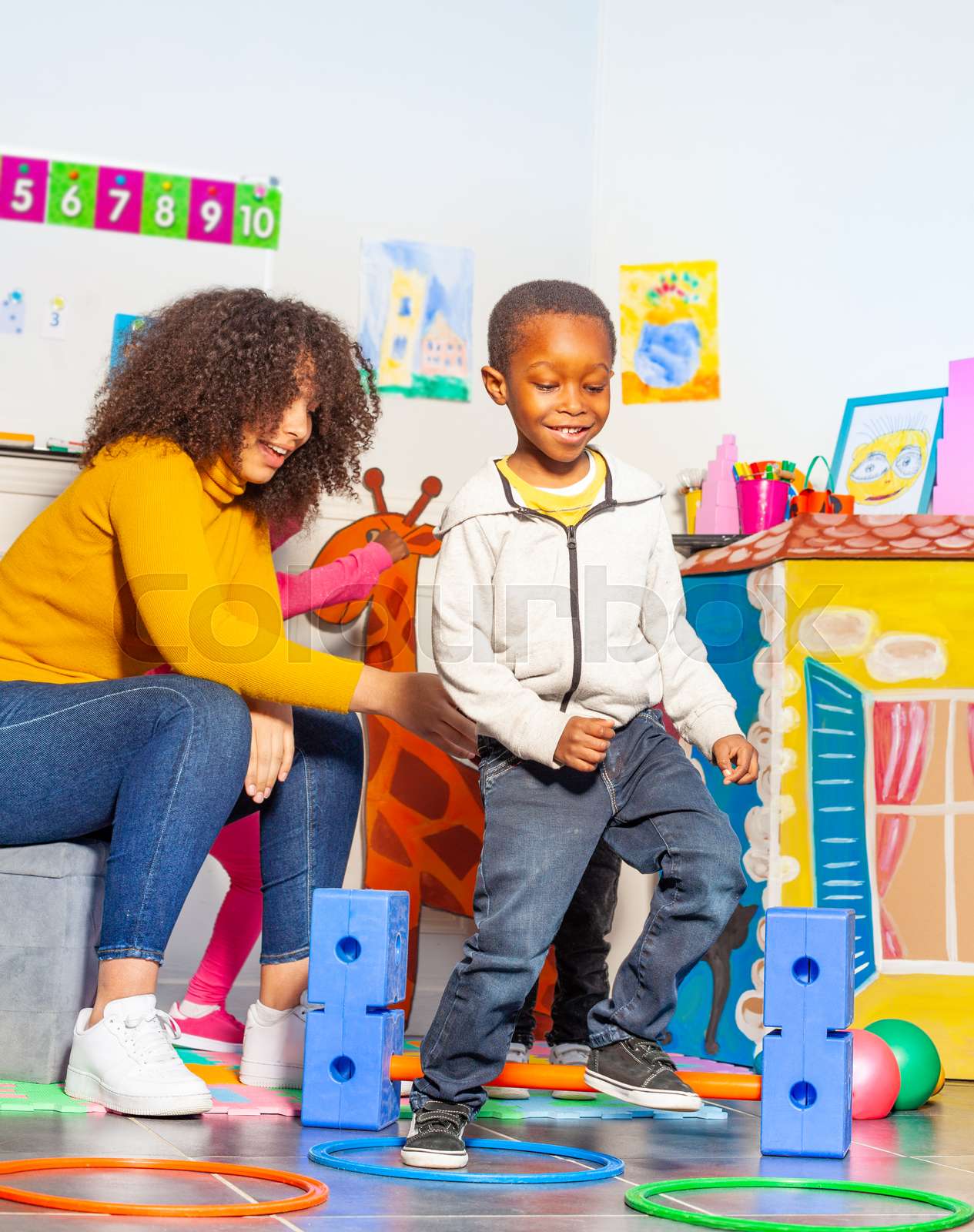 Fun active development activity with little boy | Stock image | Colourbox