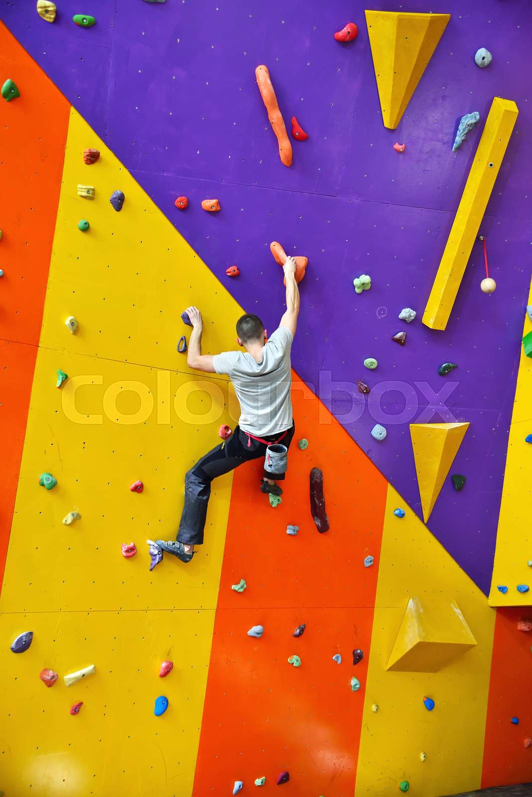 Climber On Artificial Climbing Wall | Stock image | Colourbox