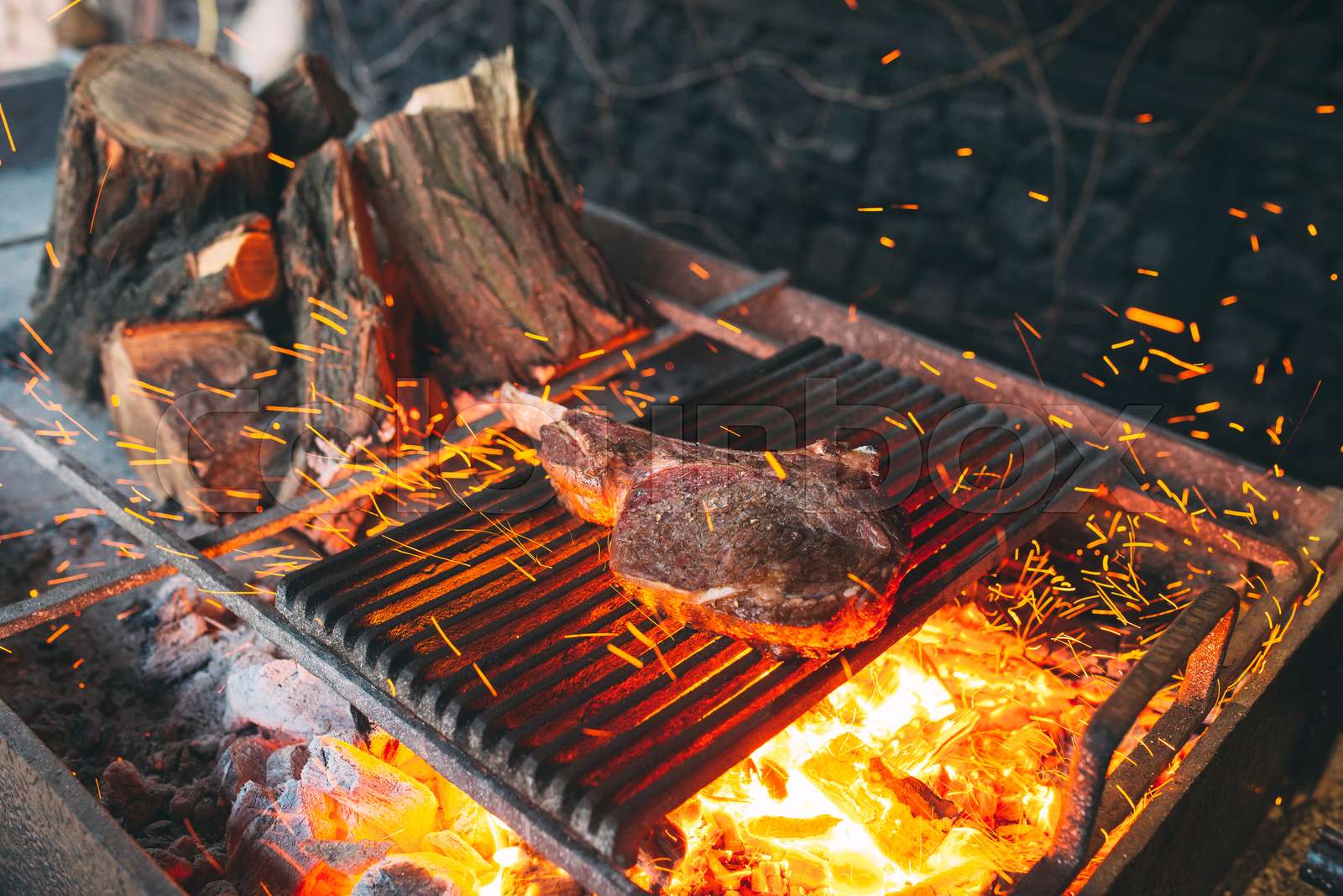 Beef steak is cooked on fire. Beef Rib BBQ . | Stock image | Colourbox