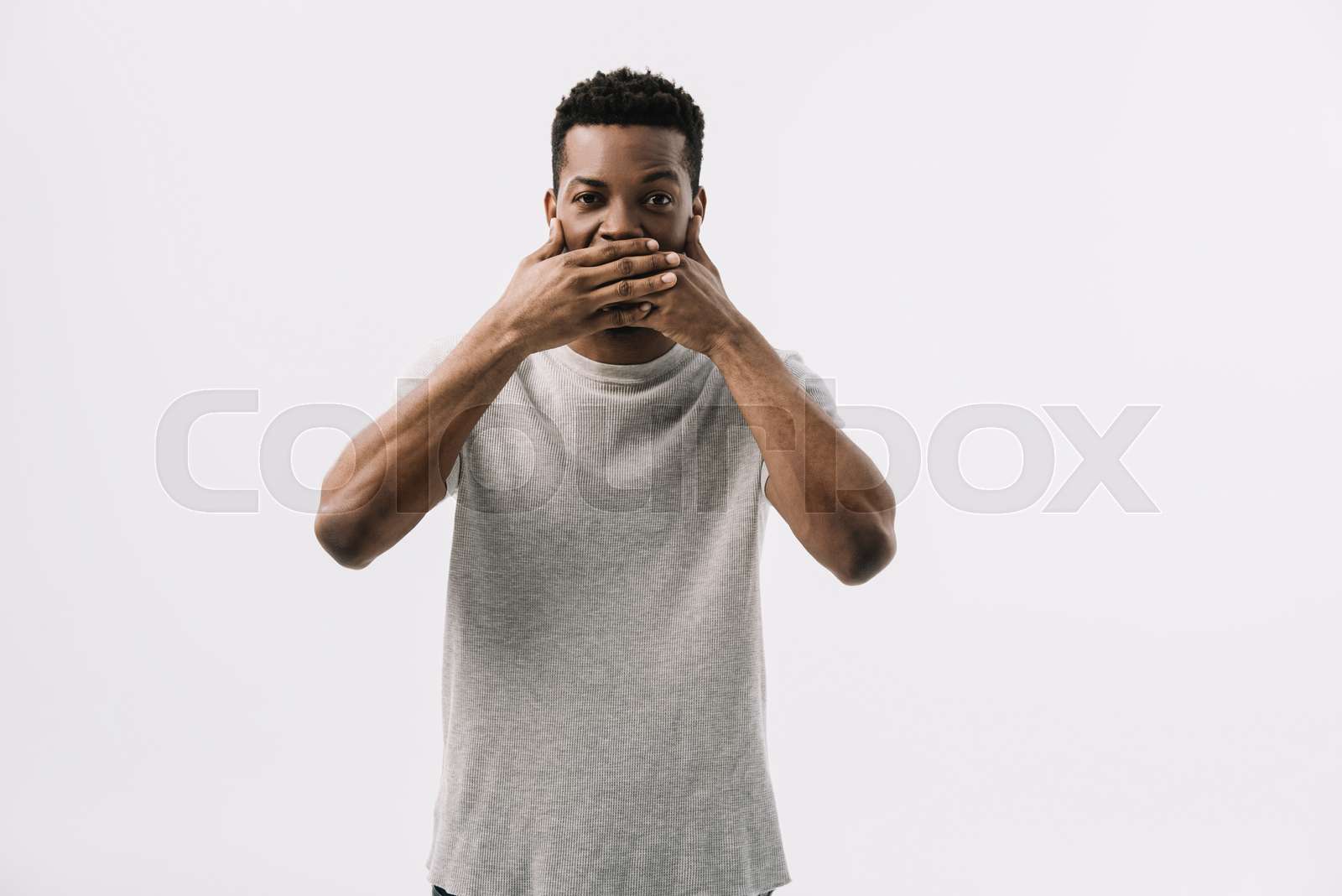 african american man covering mouth isolated on white | Stock image ...