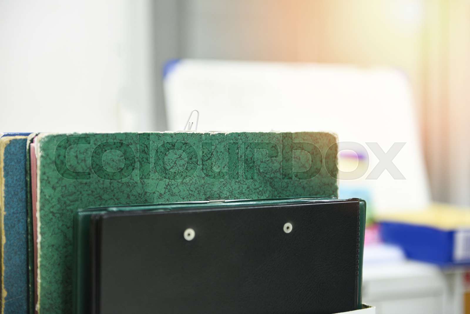 Documents in files placed in the filing cabinet - business paper ...