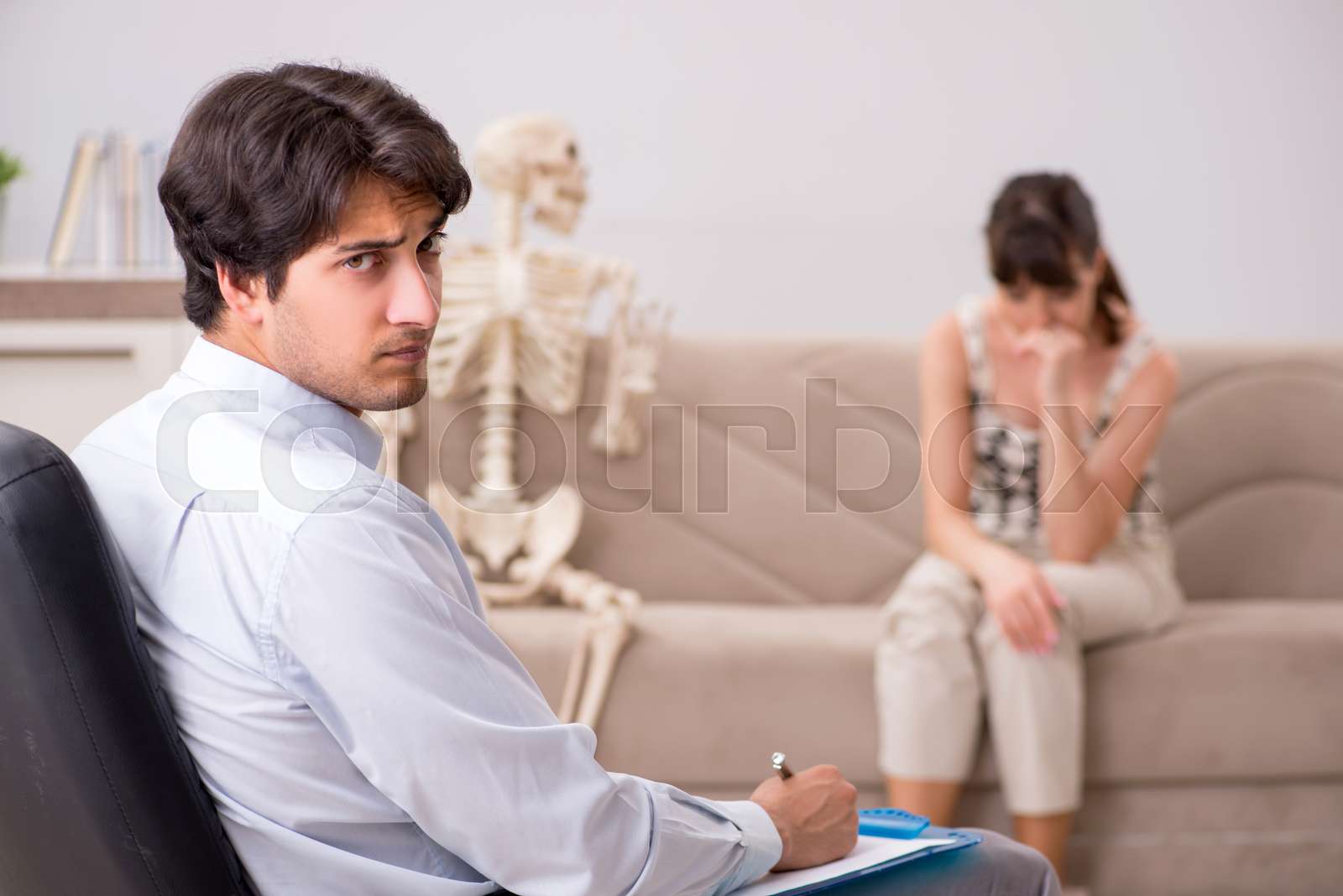 Young patient visiting psychologist for therapy | Stock image | Colourbox