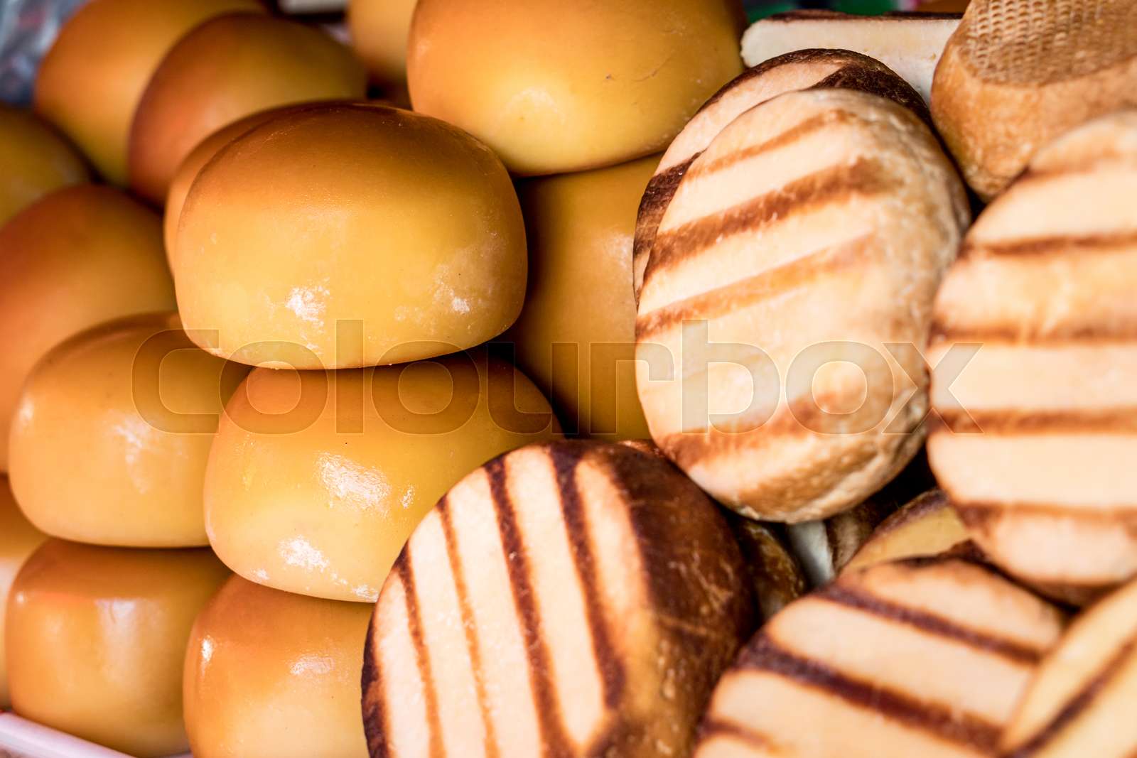 Traditional romanian smoked sheep cheeses cas and cascaval | Stock ...