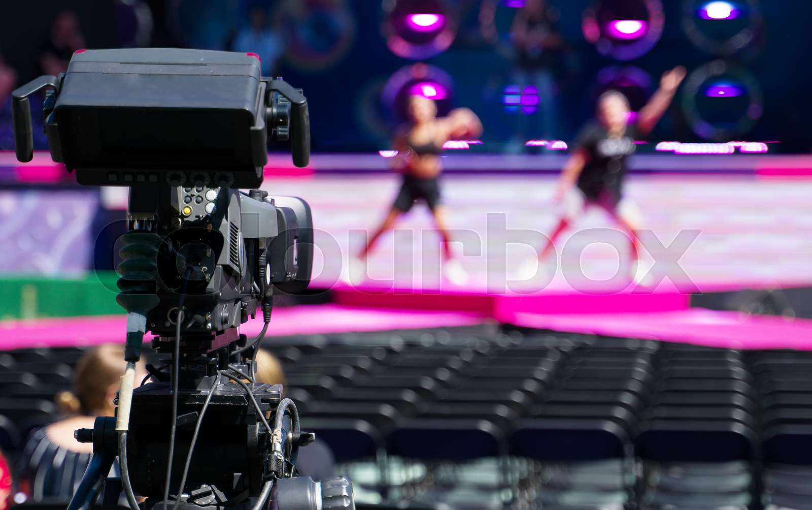 Professional video camera is filming live performance. | Stock image ...