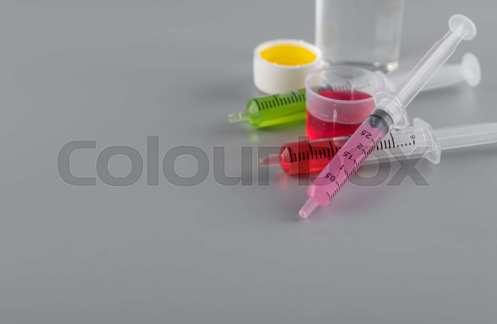 Children syringe for receiving cough syrup with syrup medicine | Stock ...