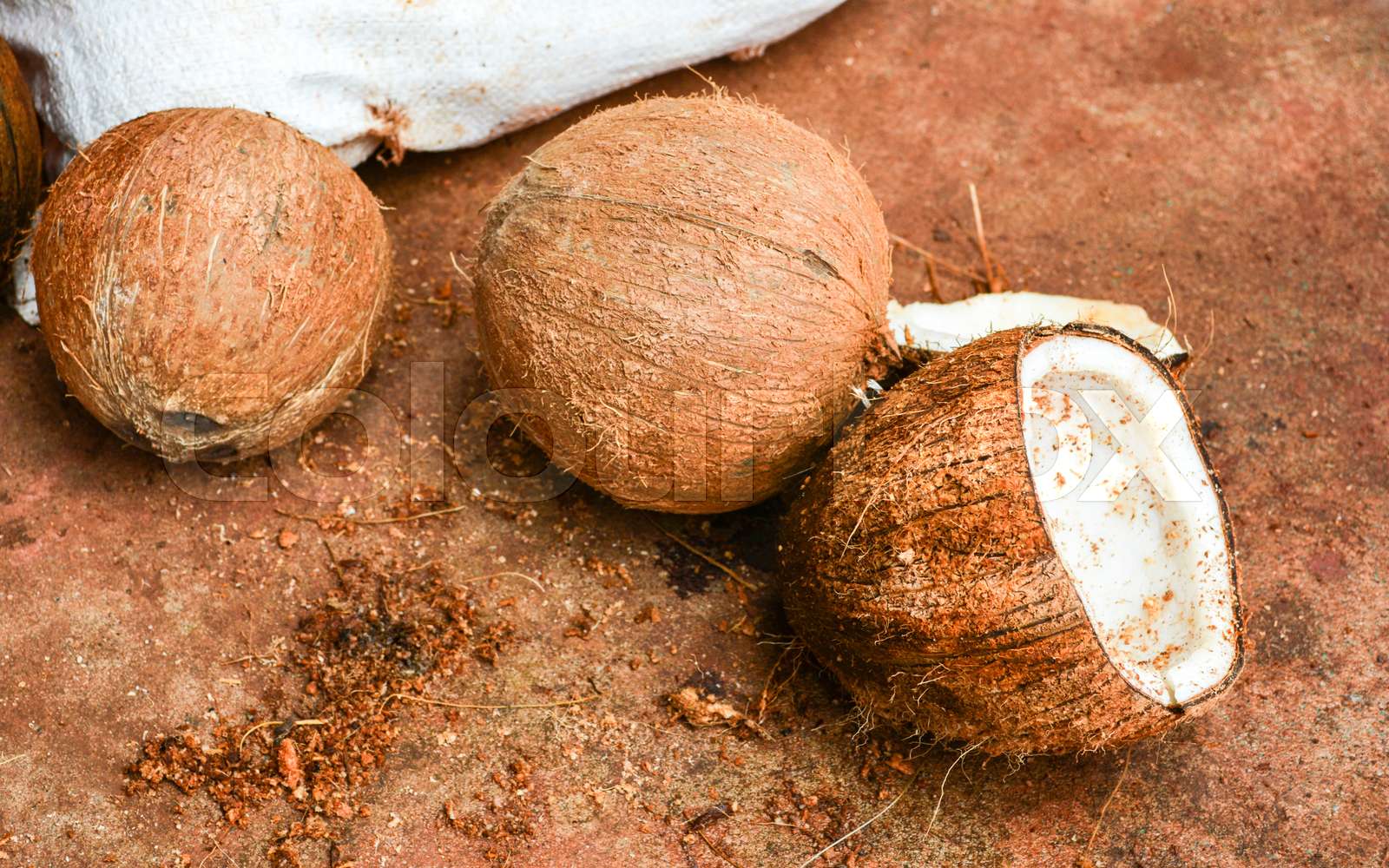 peeled ripe coconut half cut on ground / Tropical fruits natural for ...