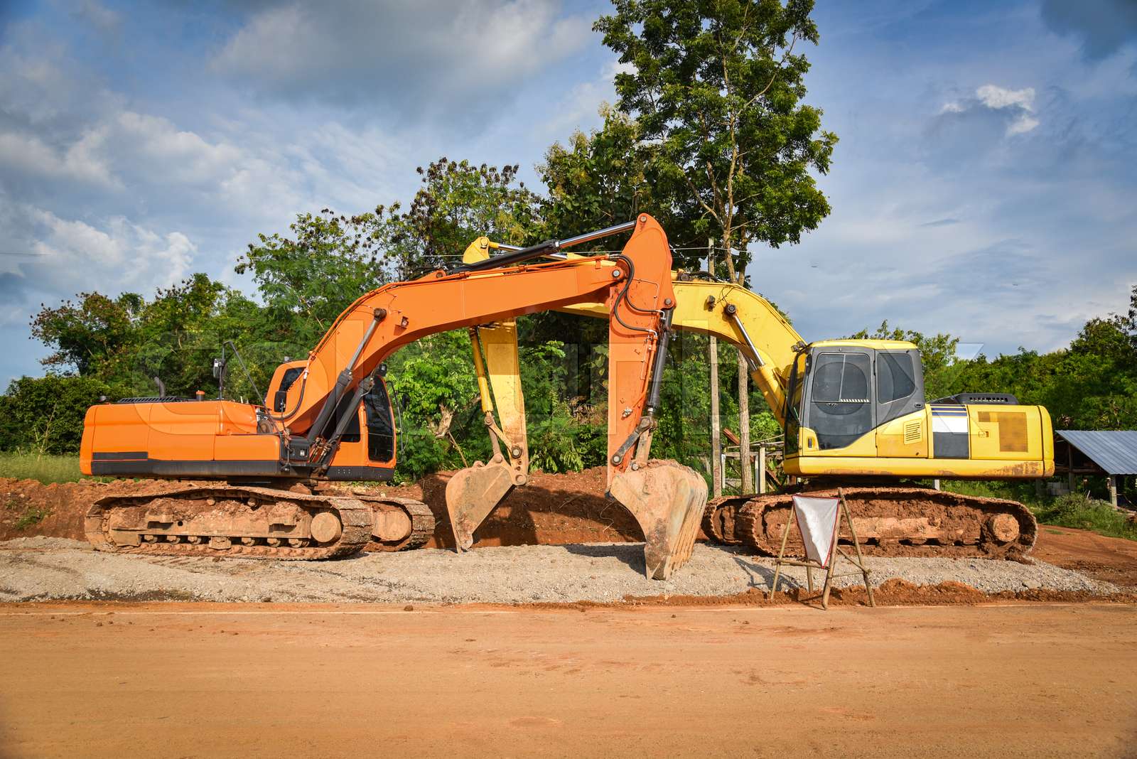 road construction with backhoe loader / yellow and orange modern ...
