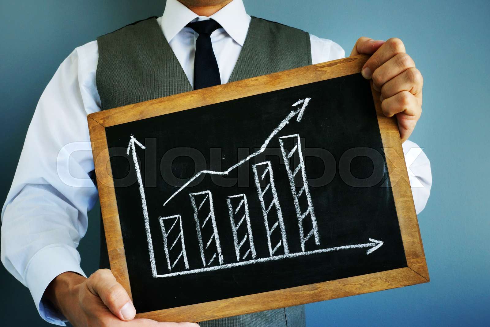 Business growth concept. Graph with raised arrow. | Stock image | Colourbox