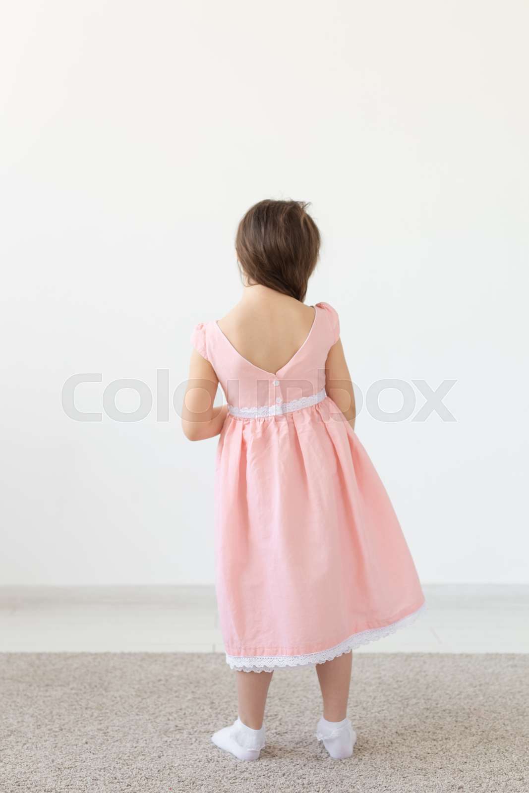 Fashion designer, kids and child concept - back view of little girl ...