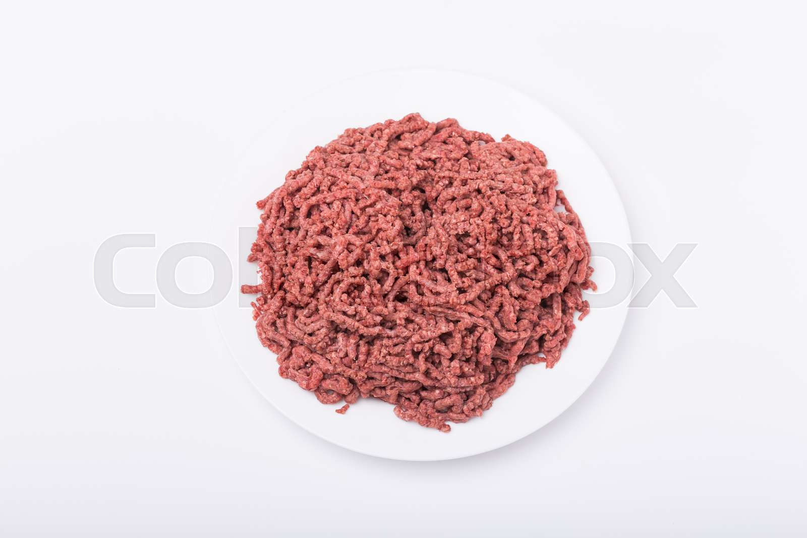 Top view of raw minced beef meat isolated on white | Stock image ...
