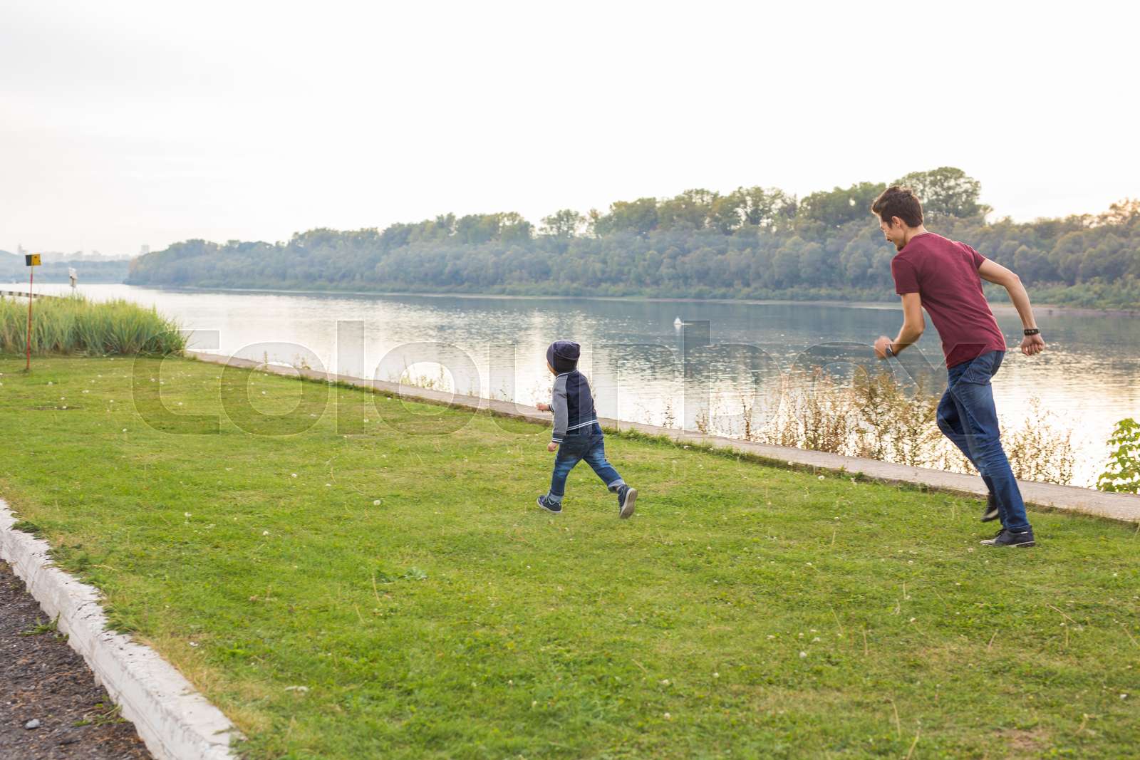 Parenthood and children concept - Father playing with a little son ...