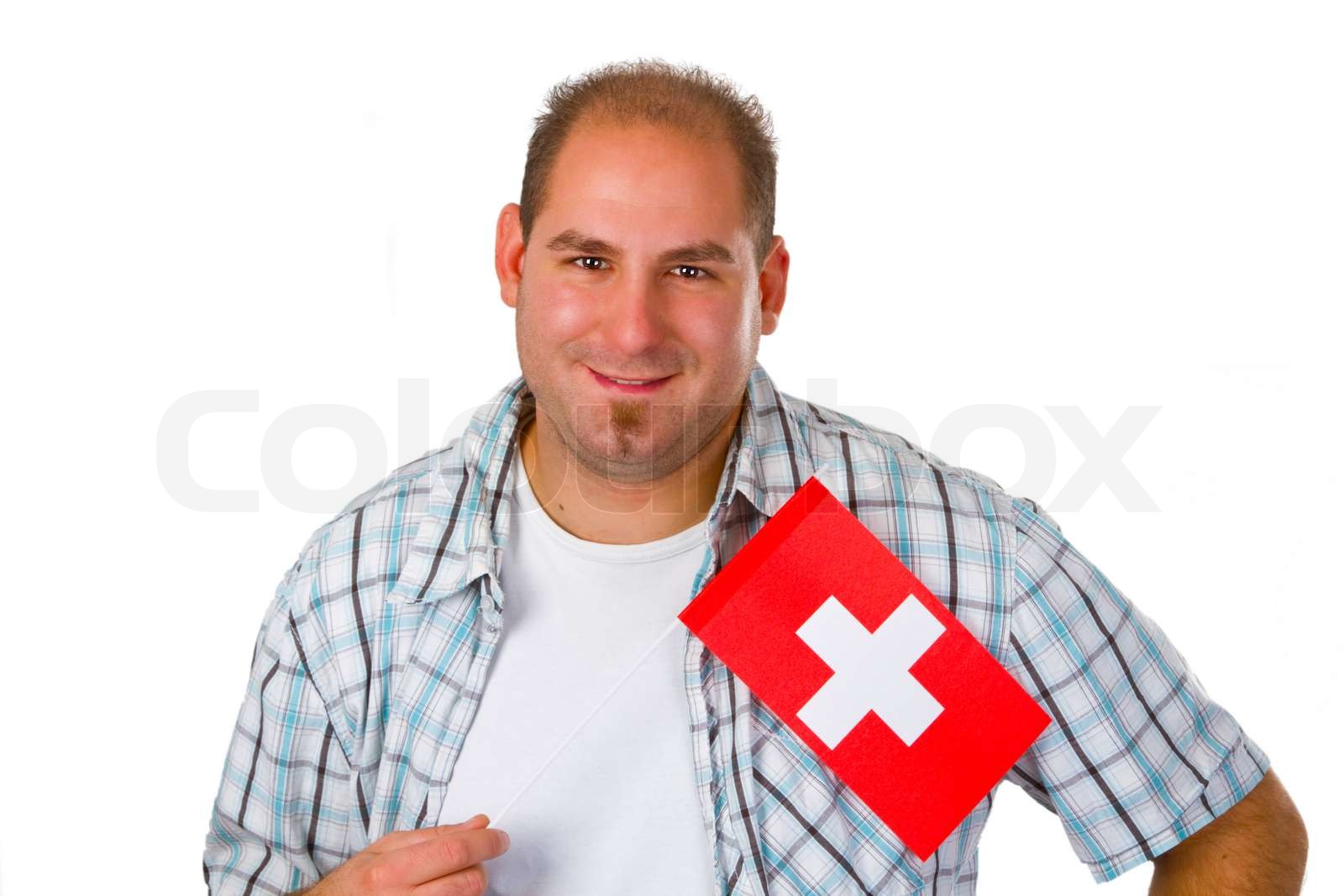 Young man with swiss flag | Stock image | Colourbox
