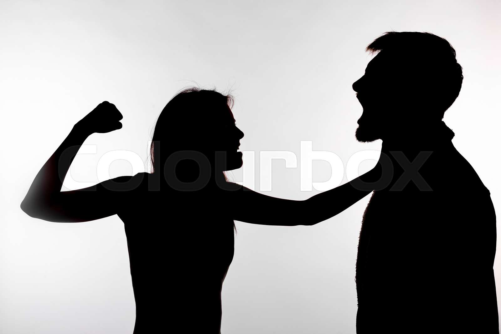Domestic violence and abuse concept - Silhouette of a woman slapping a ...