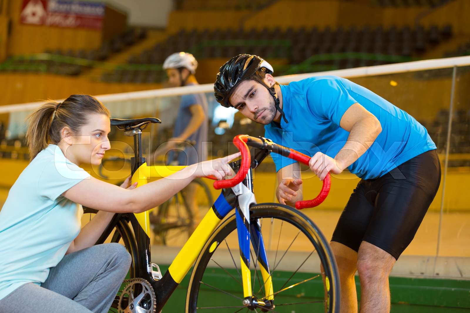 cyclist and coach in a velodrome | Stock image | Colourbox